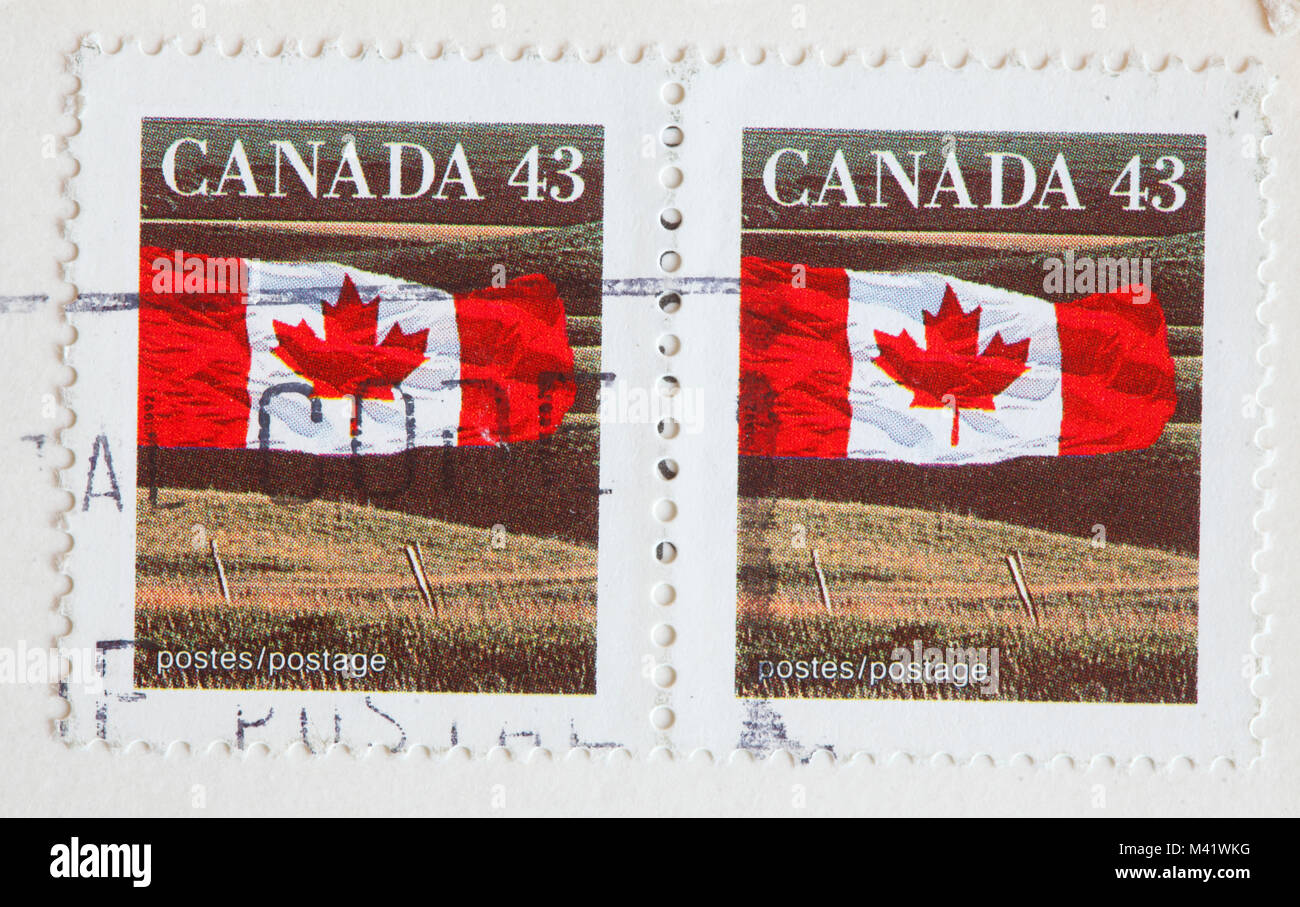 old Canadian Poststamp with Maple Leaf on a Postcard Stock Photo - Alamy