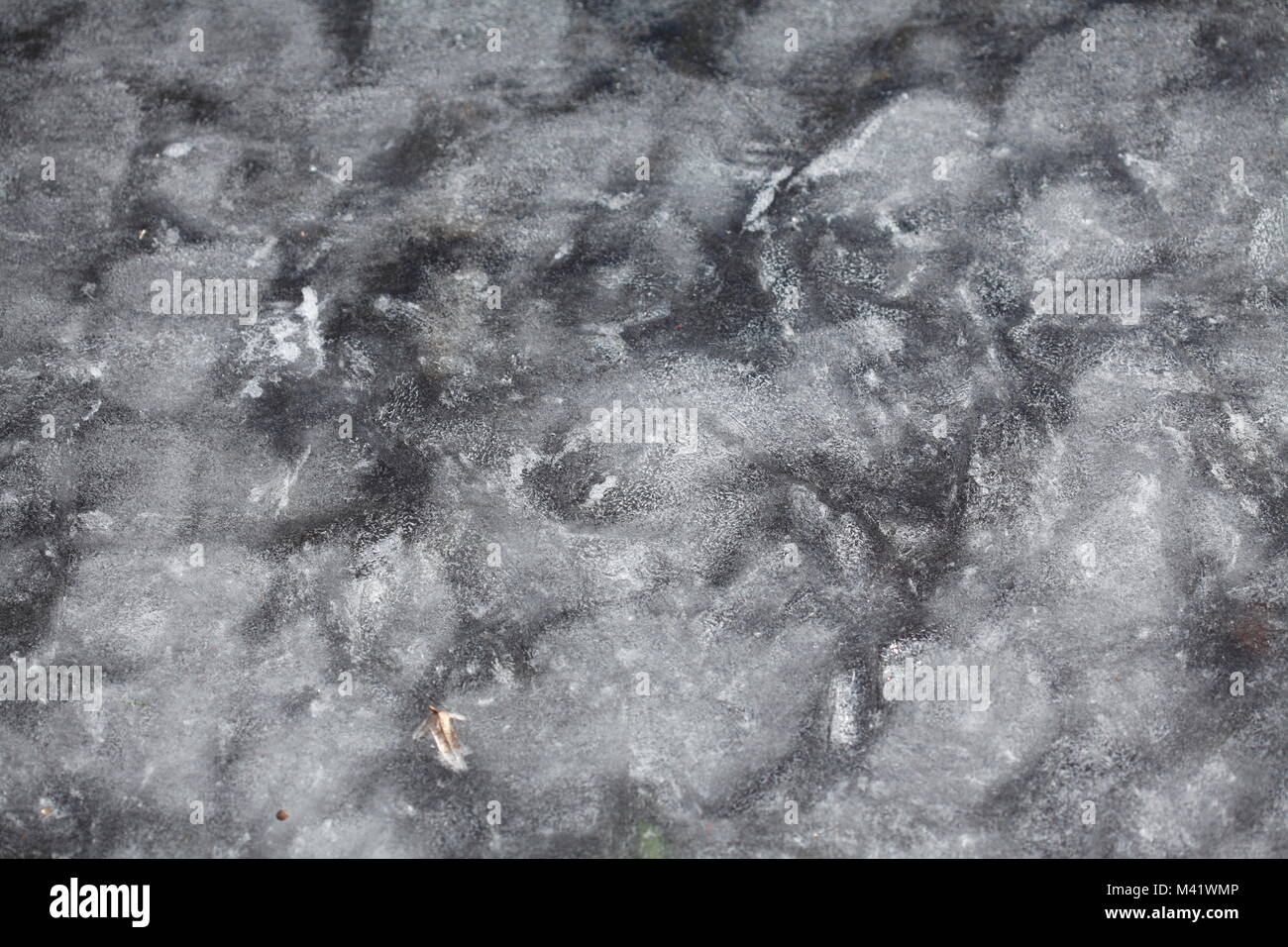 ice cover on an icebound lake Stock Photo - Alamy