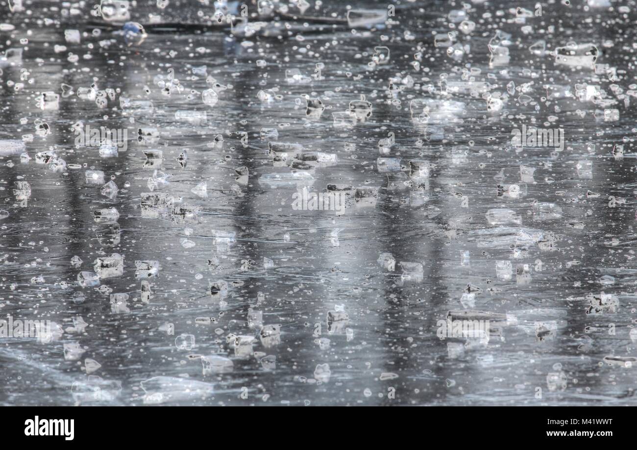 ice cover on an icebound lake Stock Photo - Alamy