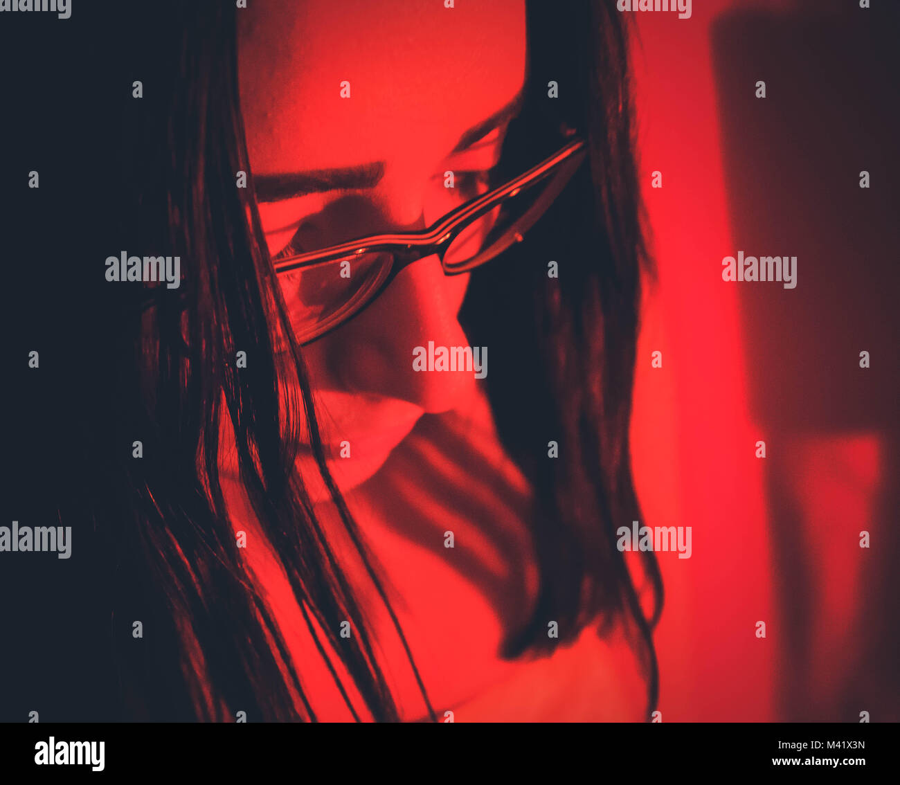Girl in red light hi-res stock photography and images - Alamy