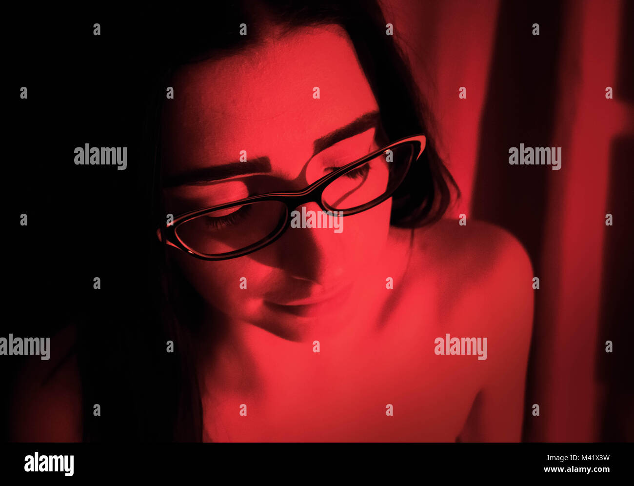 Girl in red light hi-res stock photography and images - Alamy