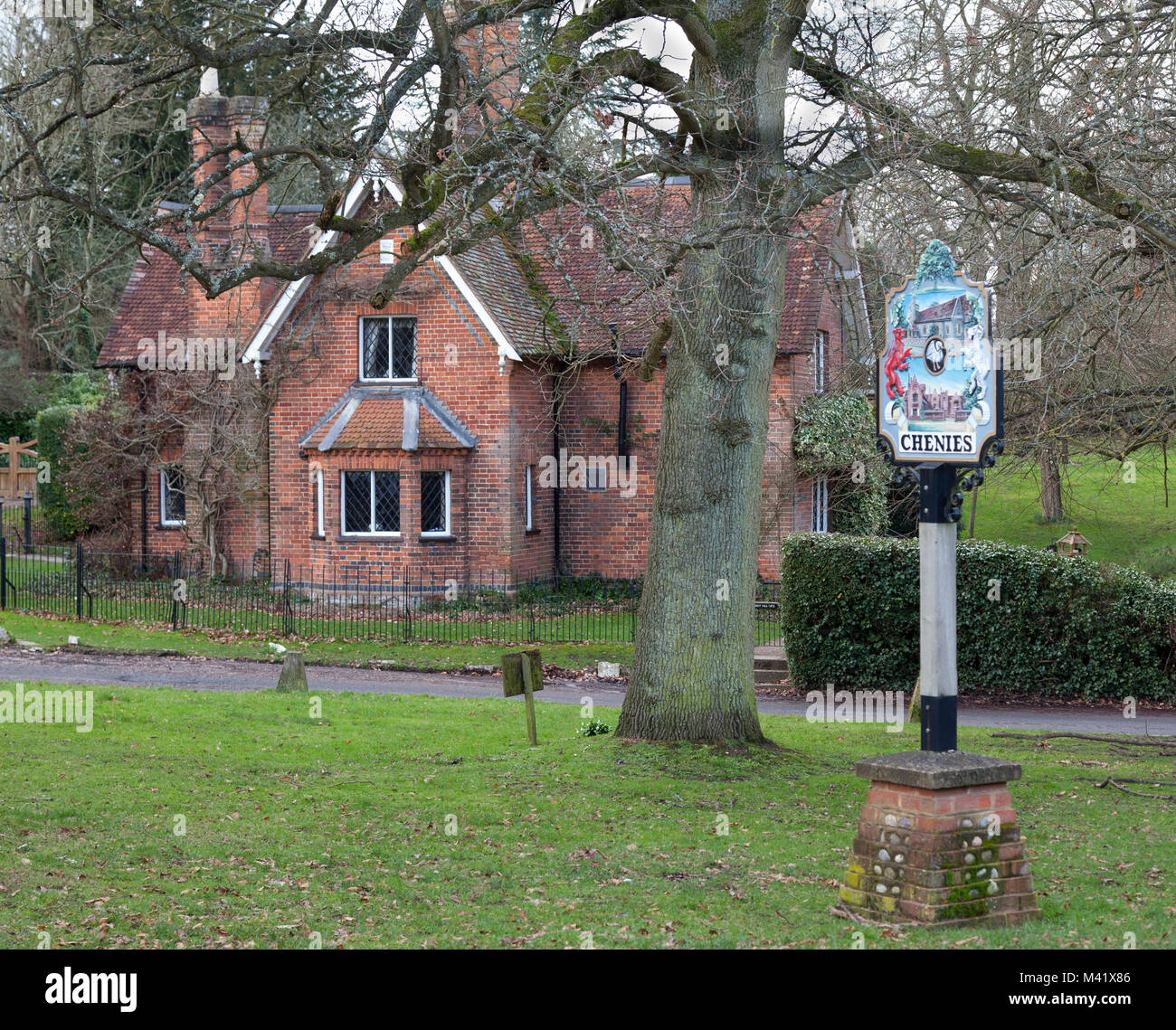Village green and illustrated sign, Chenies village, Buckinghamshire ...