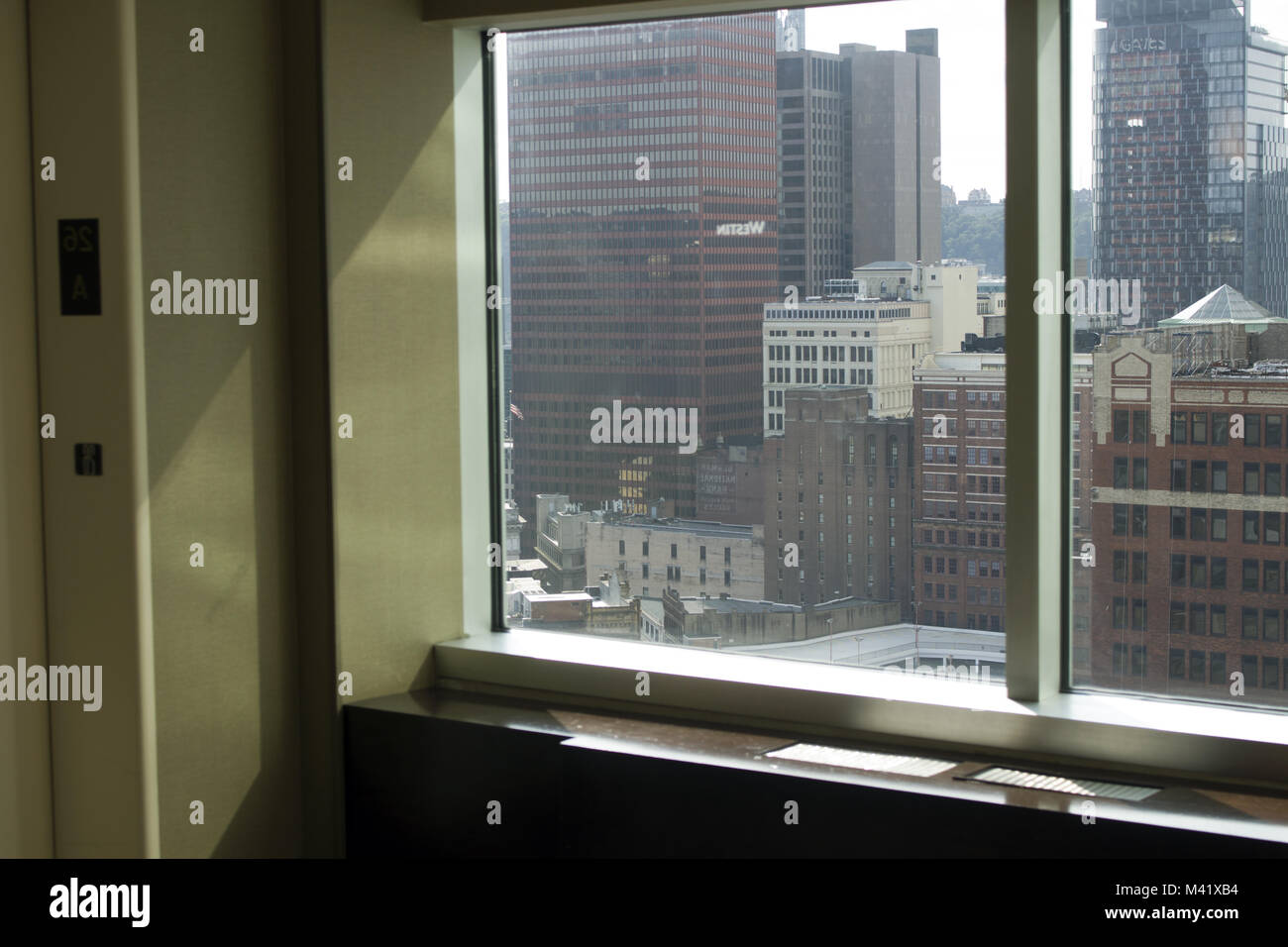 view of a city through a window Stock Photo - Alamy