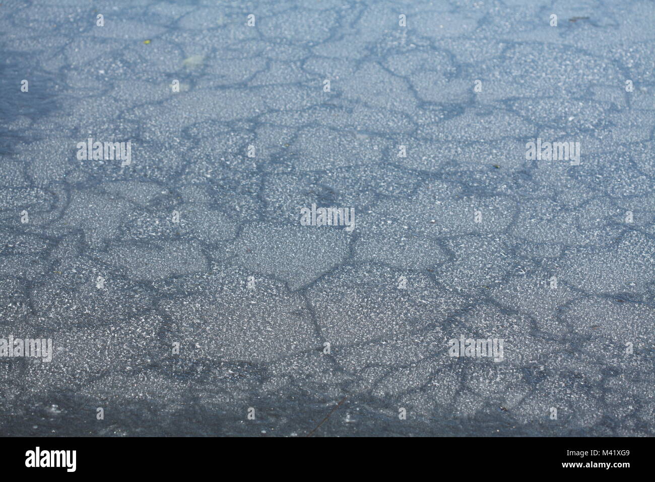 ice cover on an icebound lake Stock Photo - Alamy