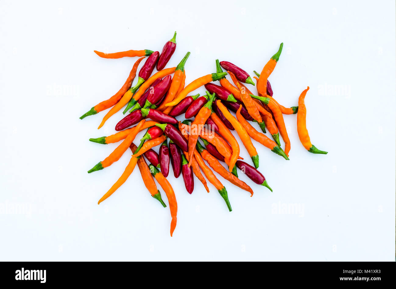 group of spicy colorful red and orange chilli pepper vegetables Stock ...