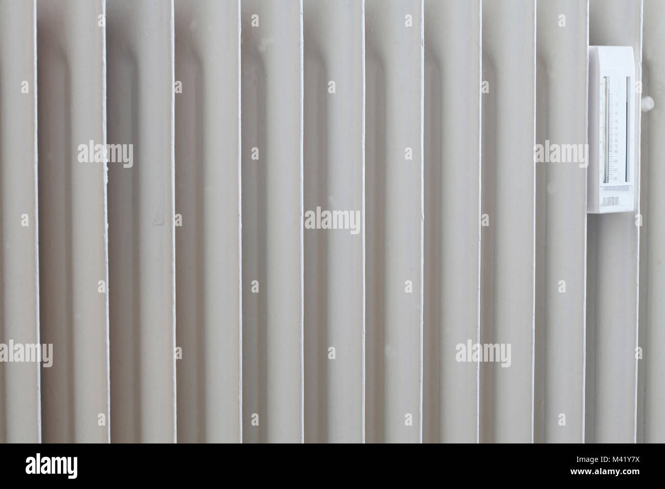 Old white heater from metal with heating counter Stock Photo - Alamy