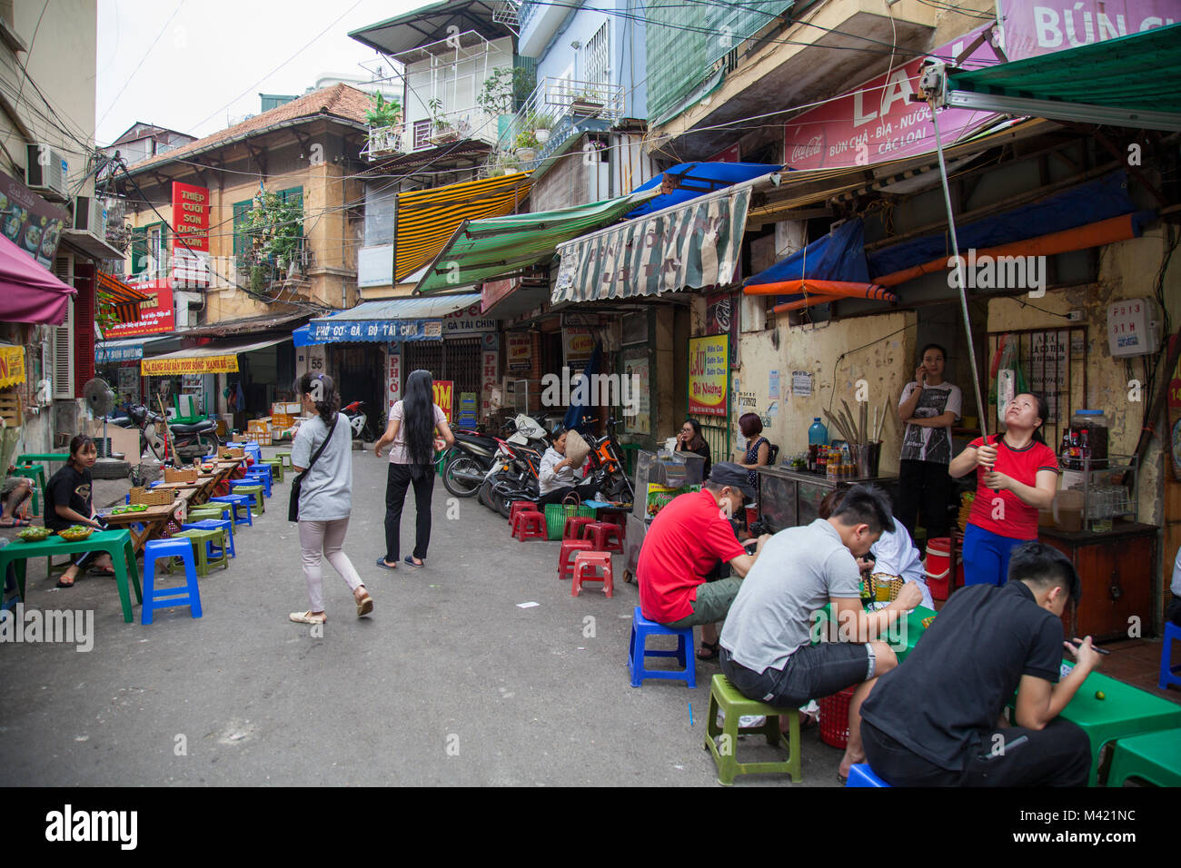 local restaurants on a street in Hanoi, Vietnam Stock Photo - Alamy