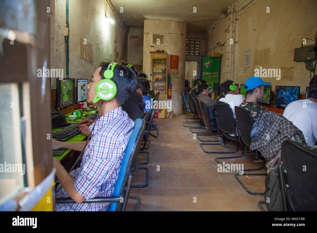 playing video Games in a gaming center in Sapa Vietnam Stock Photo - Alamy