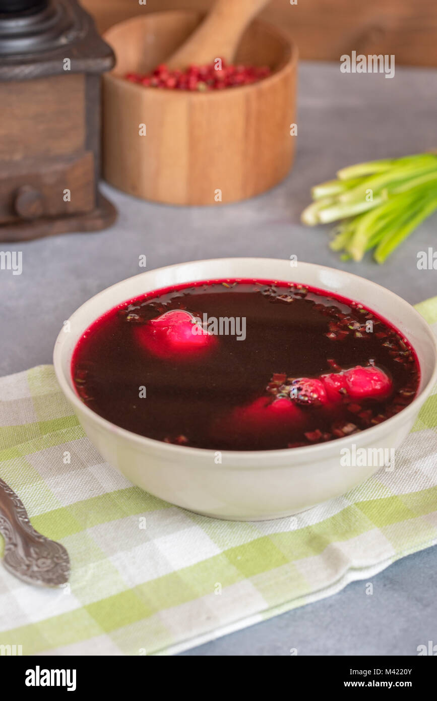 Traditional polish clear red borscht with dumplings Stock Photo - Alamy
