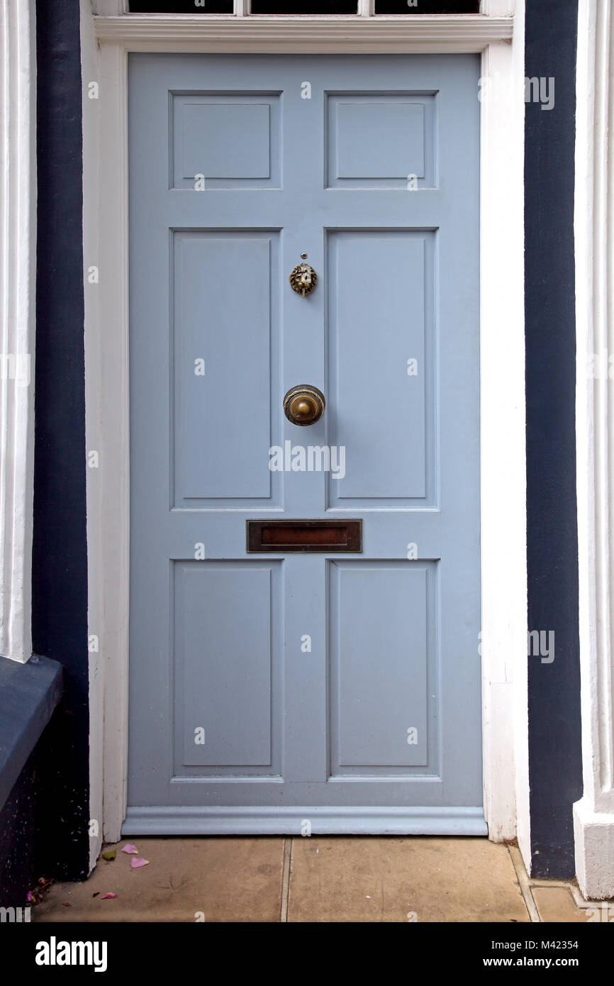 Light blue entrance door on residential house Stock Photo - Alamy
