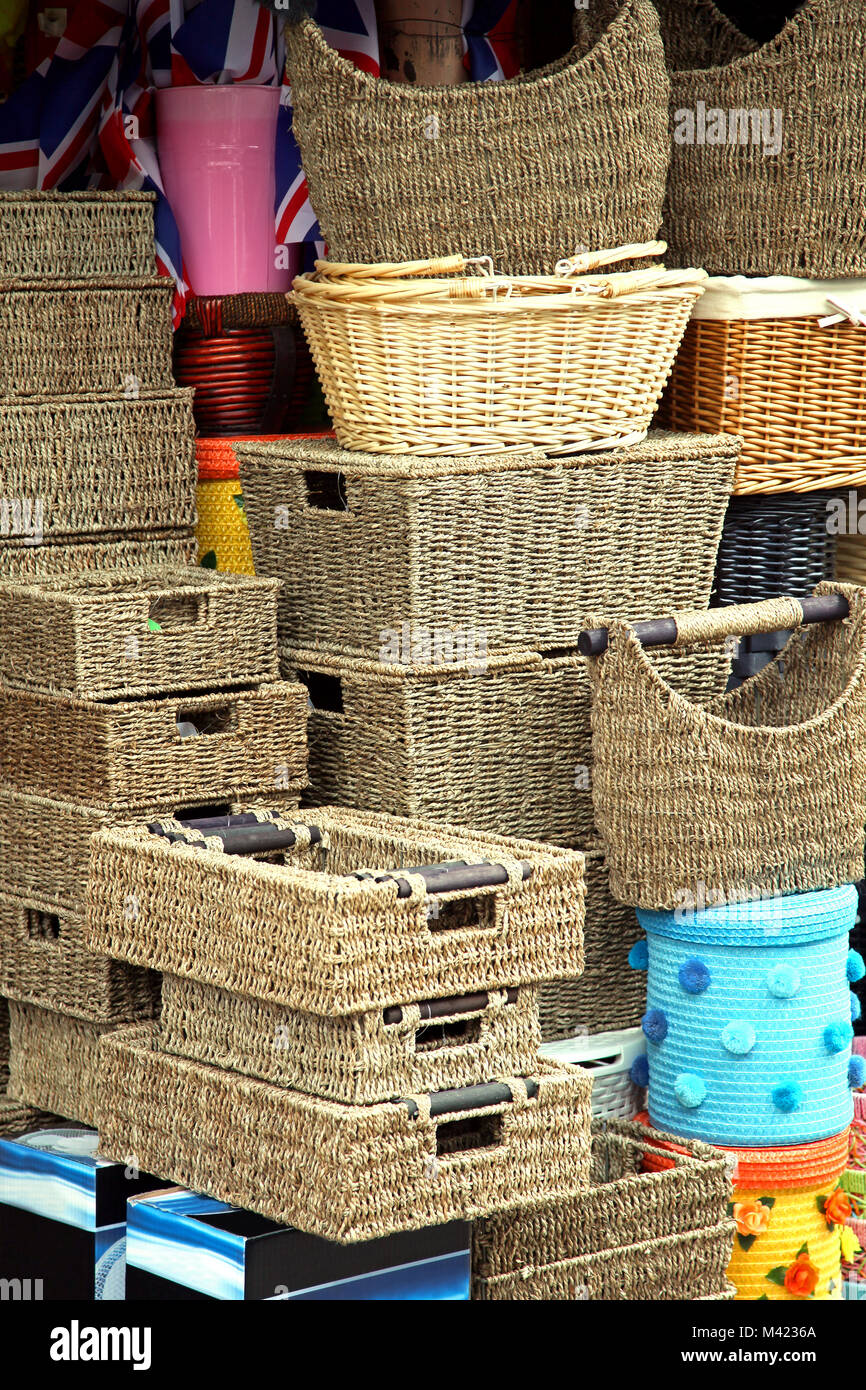 Big pile of rattan baskets sold on market Stock Photo - Alamy