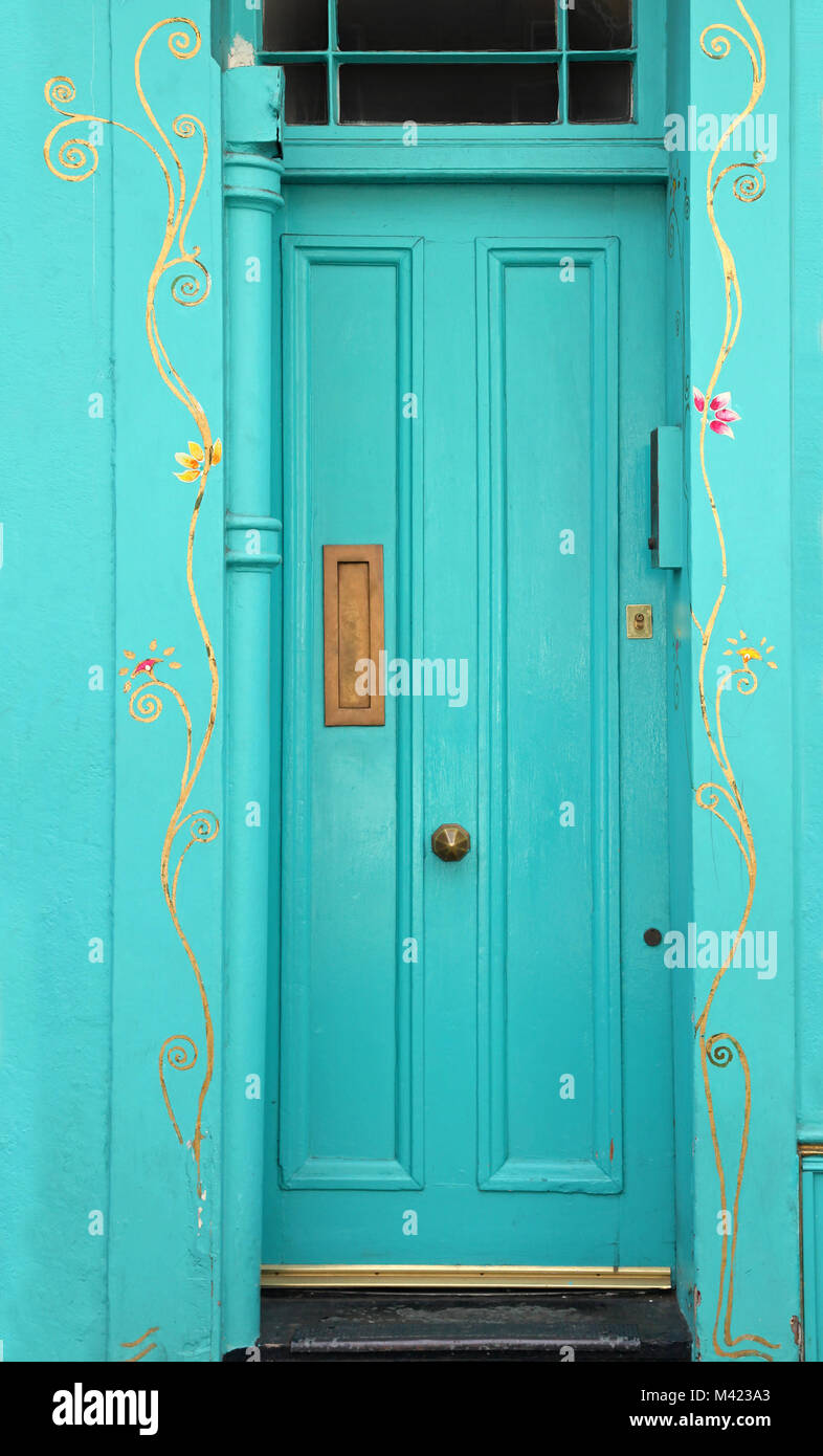 Blue entrance door in front of residential house Stock Photo - Alamy