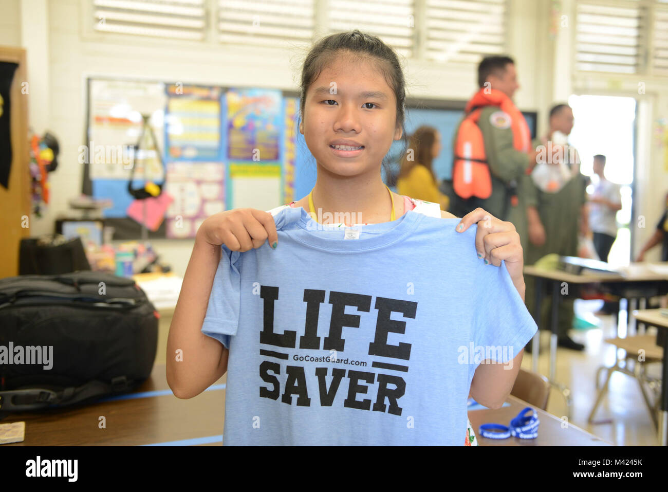 Sashka Bernaldo, a 7th-grader at Waipahu Intermediate School, holds up ...