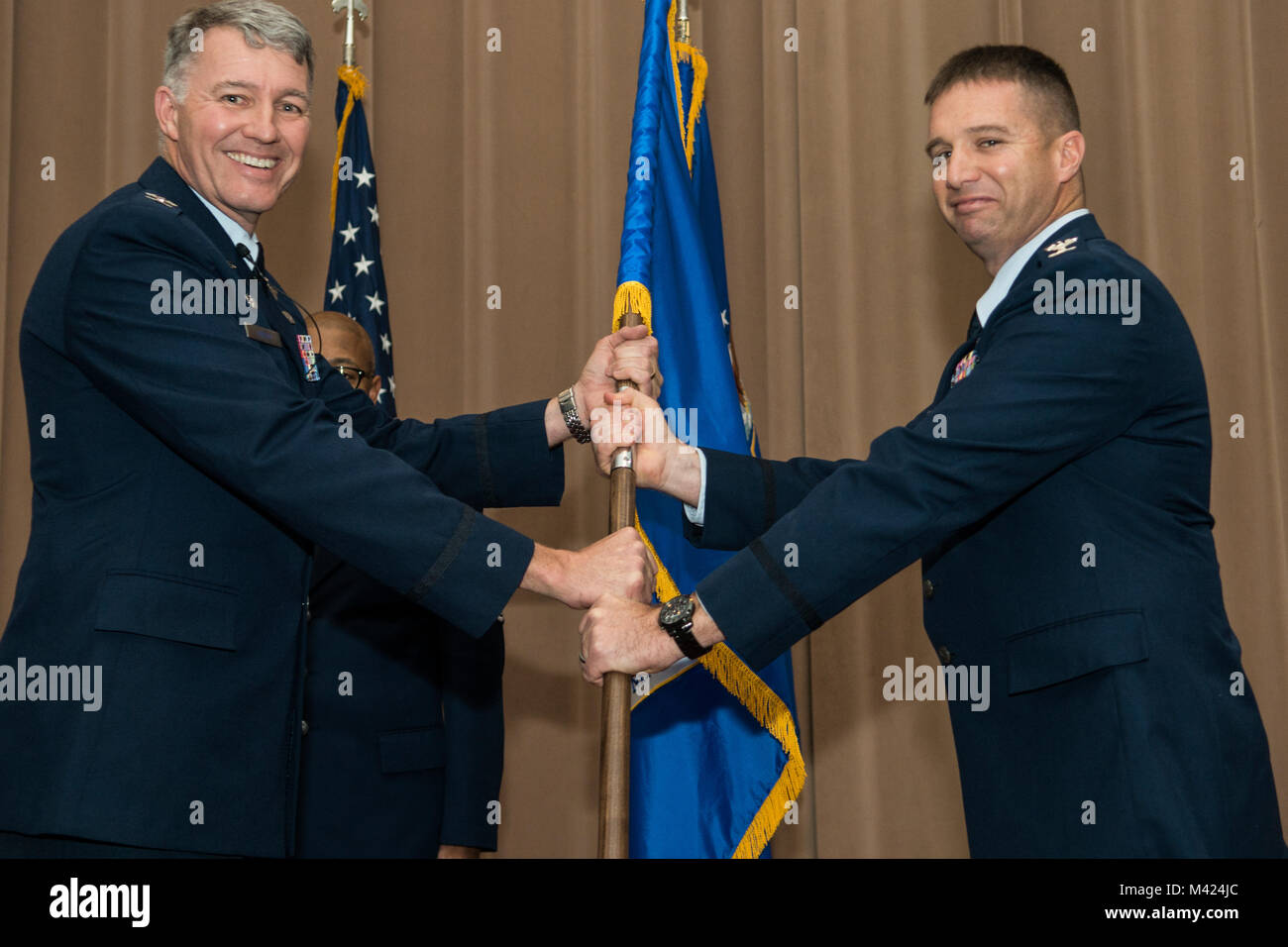 U.S. Air Force Col. Robert VanHoy II, 307th Bomb Wing commander, hands ...