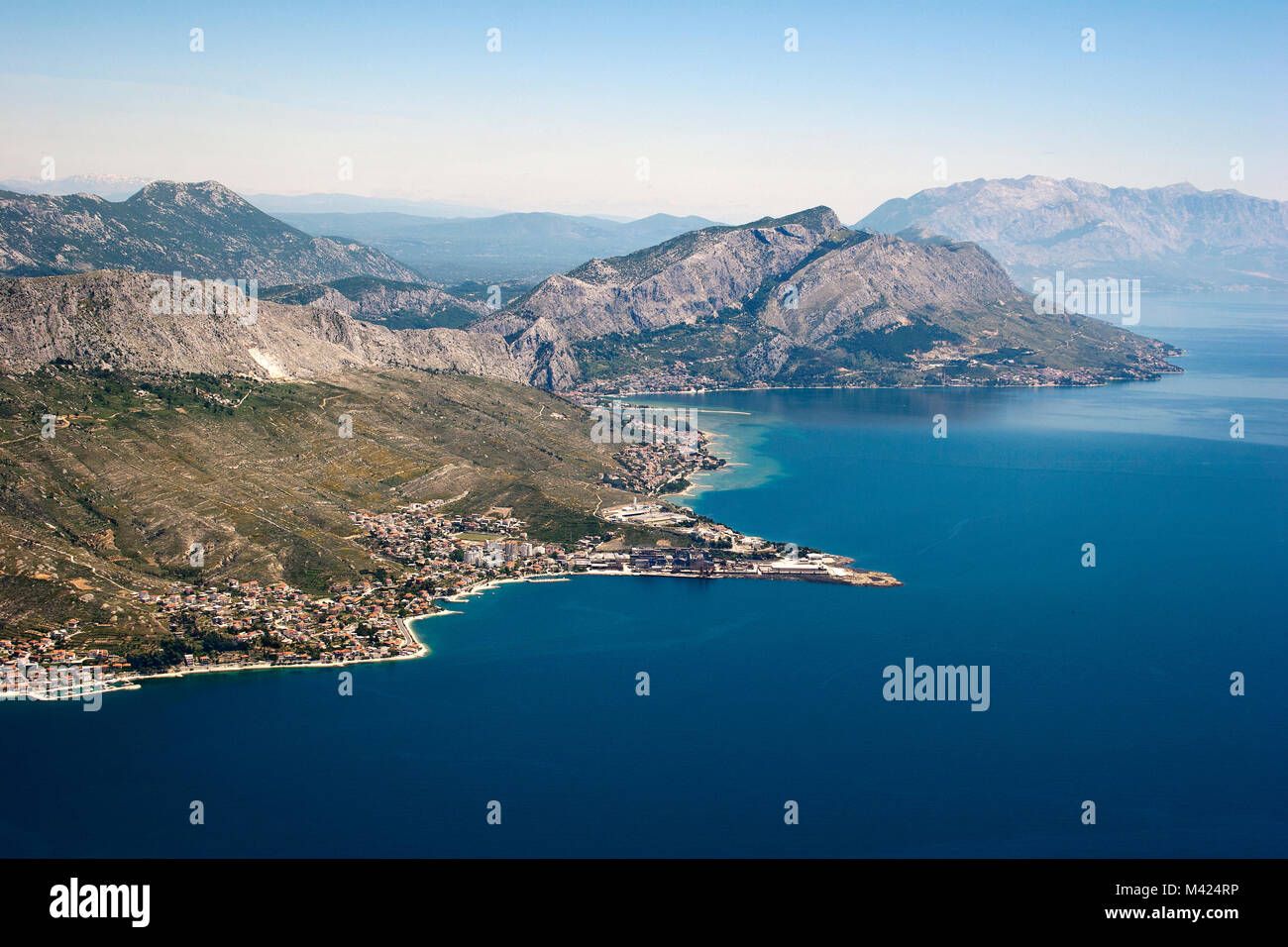 Aerial view - Omis riviera in Croatia, town Dugi rat in front plan ...