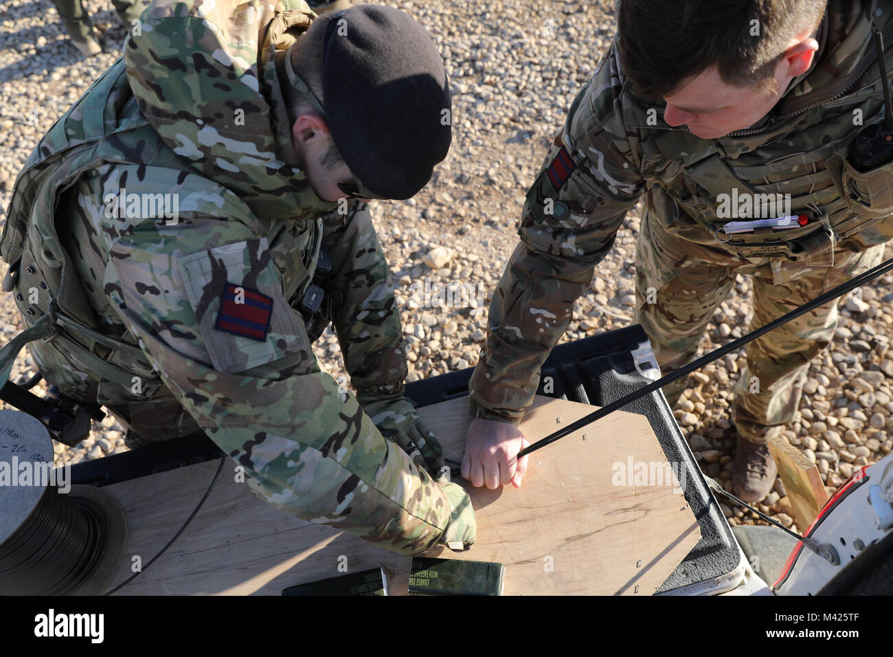 British army engineers prepare detonation cord and explosives for their ...