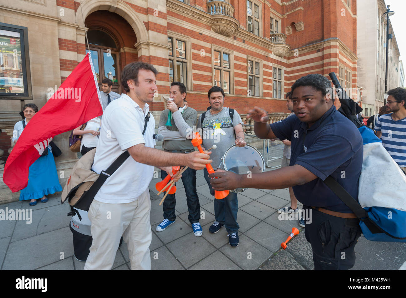 Jason Moyer-Lee hands out horns for the IWGB trade union protest at ...
