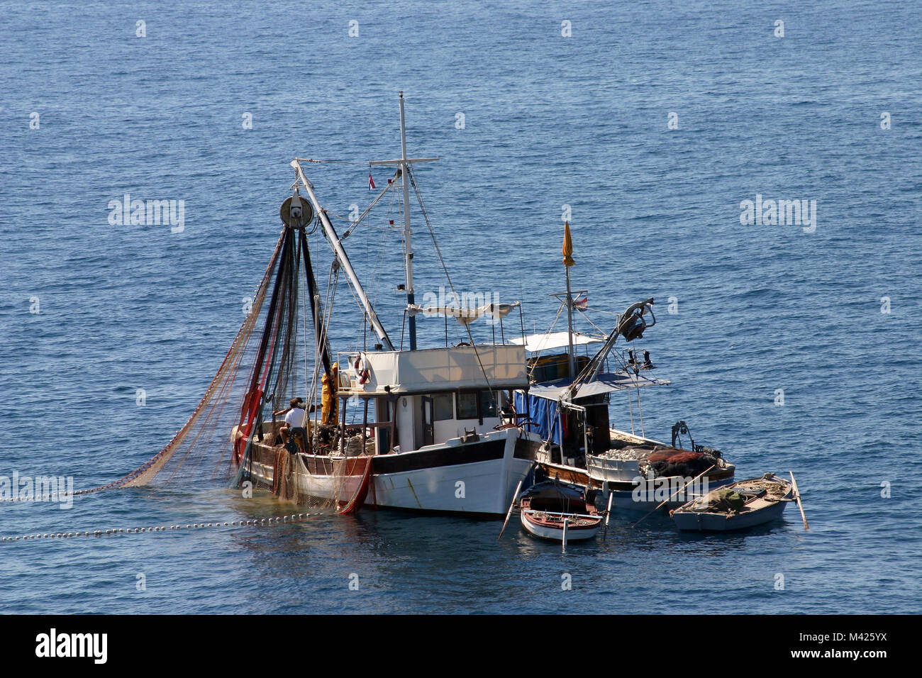 Net trawler fish pulling hi-res stock photography and images - Alamy