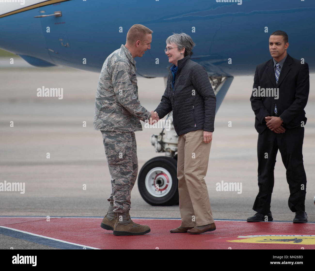 U.S. Air Force Brig. Gen. Case Cunningham, 18th Wing Commander, greets ...