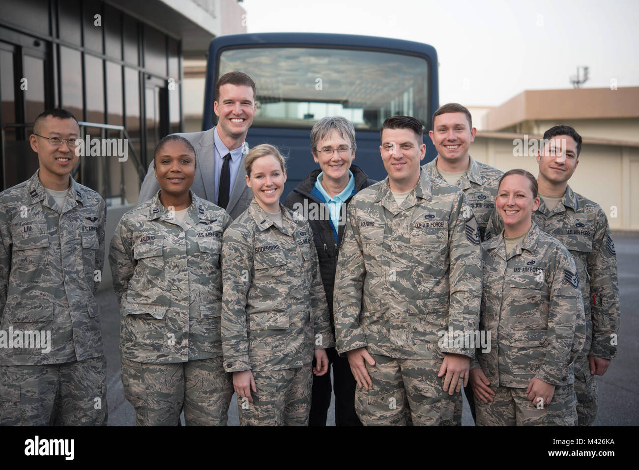 Secretary of the Air Force Heather Wilson stands with members of the ...