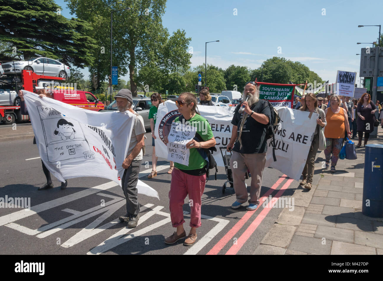 Mental Health Resistance Network protest campiagners march along the ...
