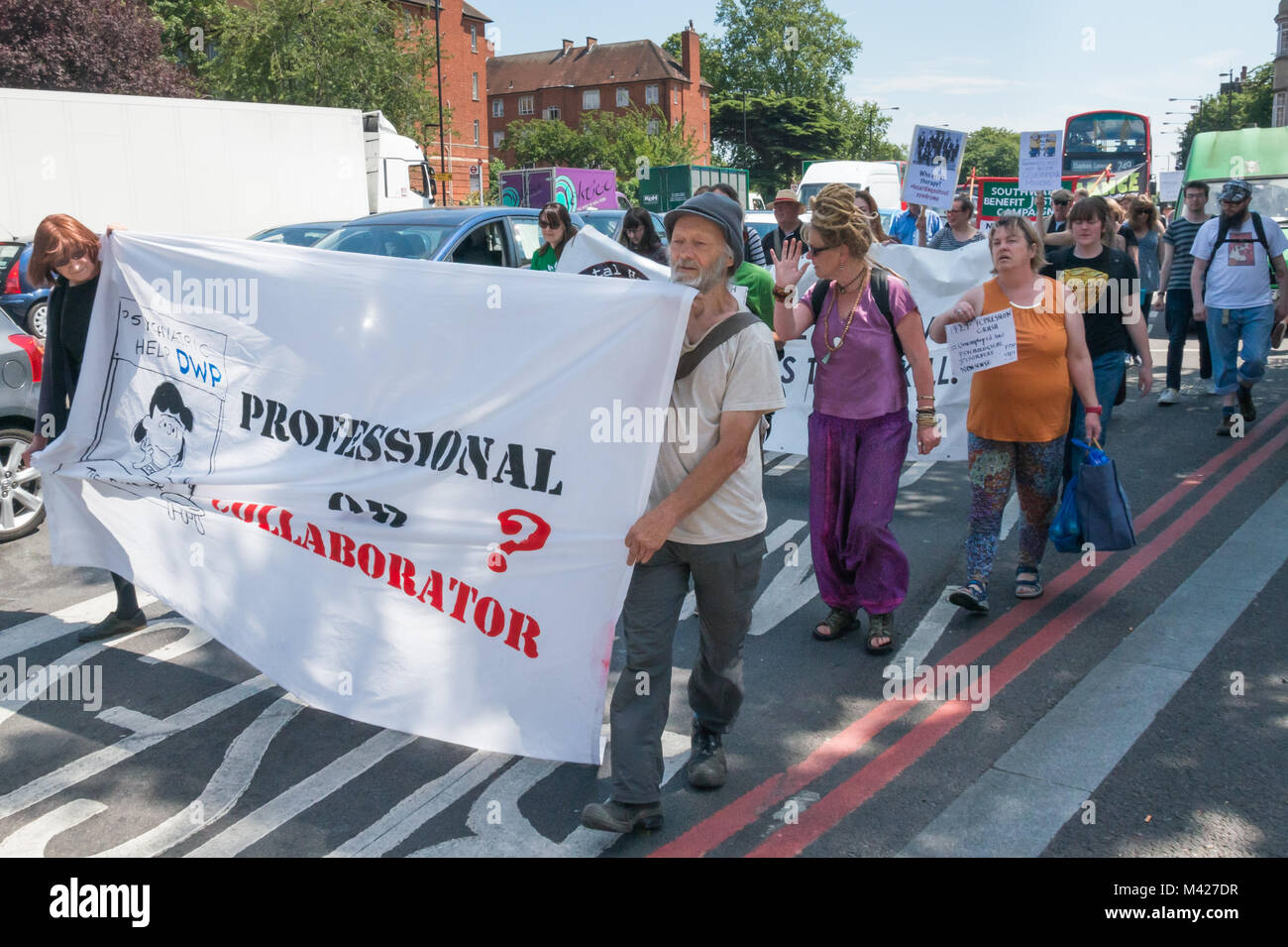 Mental Health Resistance Network protest campiagners march along the ...