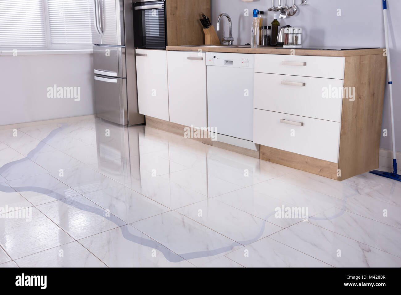 Close-up Photo Of Flooded Floor In Kitchen From Water Leak Stock Photo ...