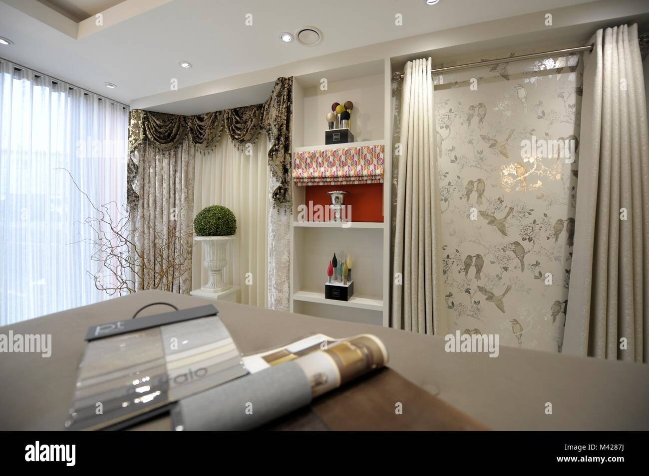 Interior detail of curtain shop display Stock Photo - Alamy