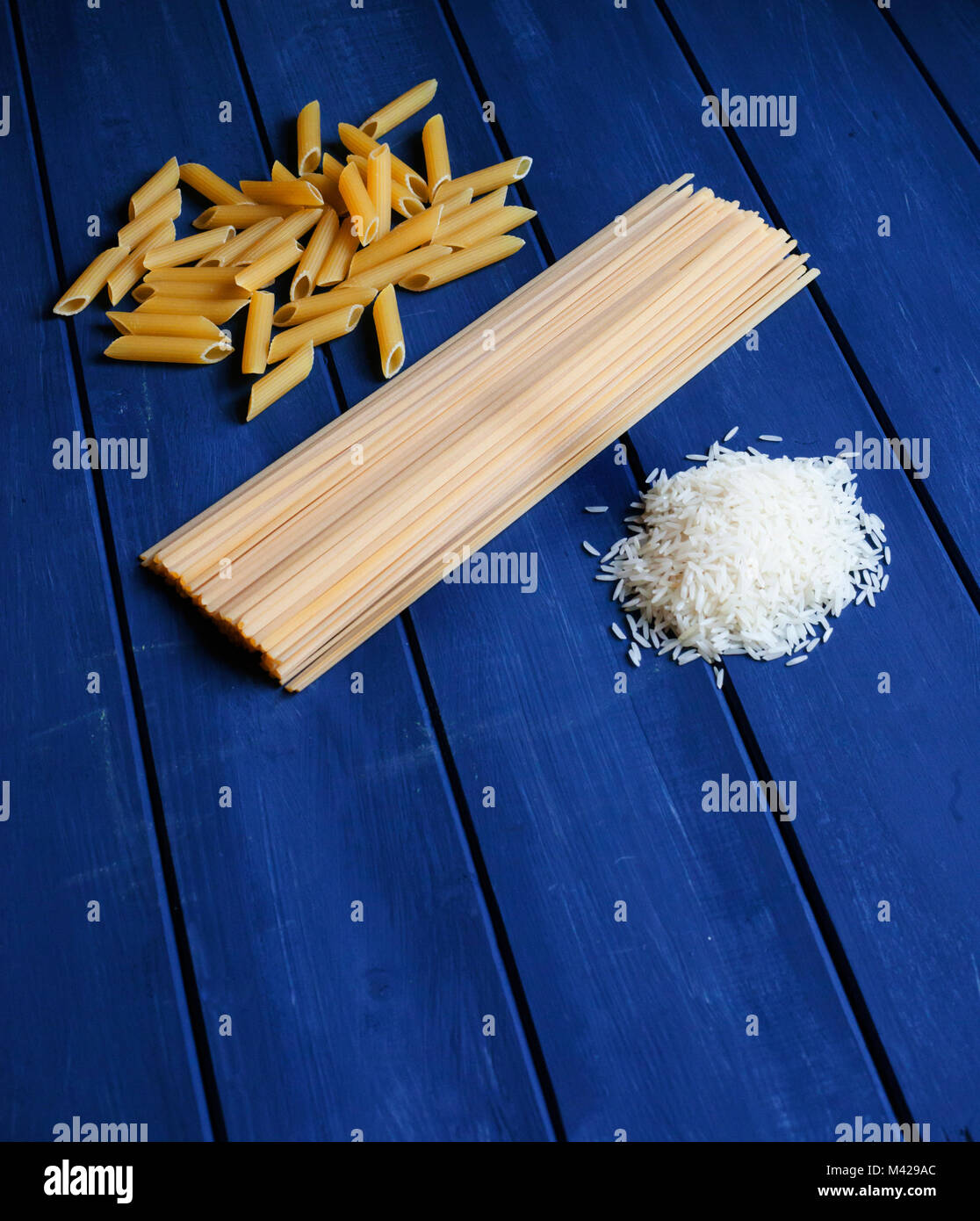 A selection of pasta and rice; some main sources of carbohydrates in ...