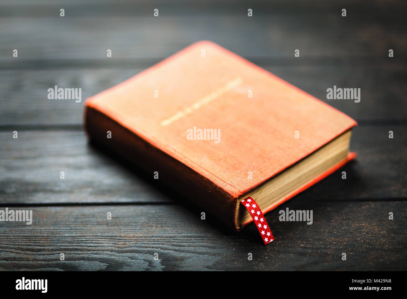 Old red book Stock Photo - Alamy