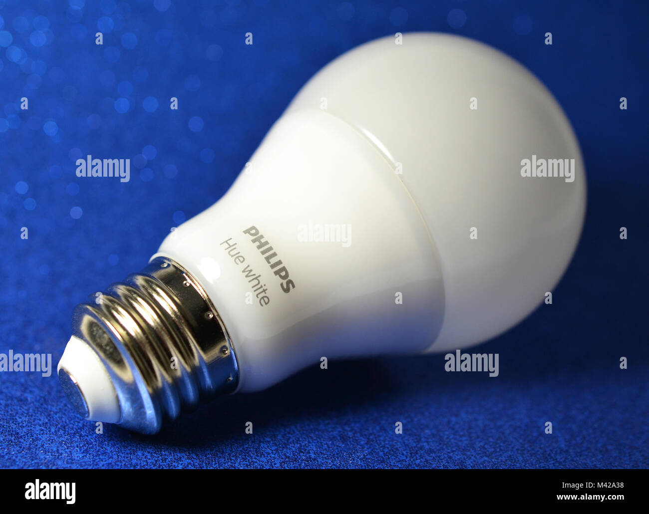 Phillips Hue Bulb on blue background Stock Photo - Alamy