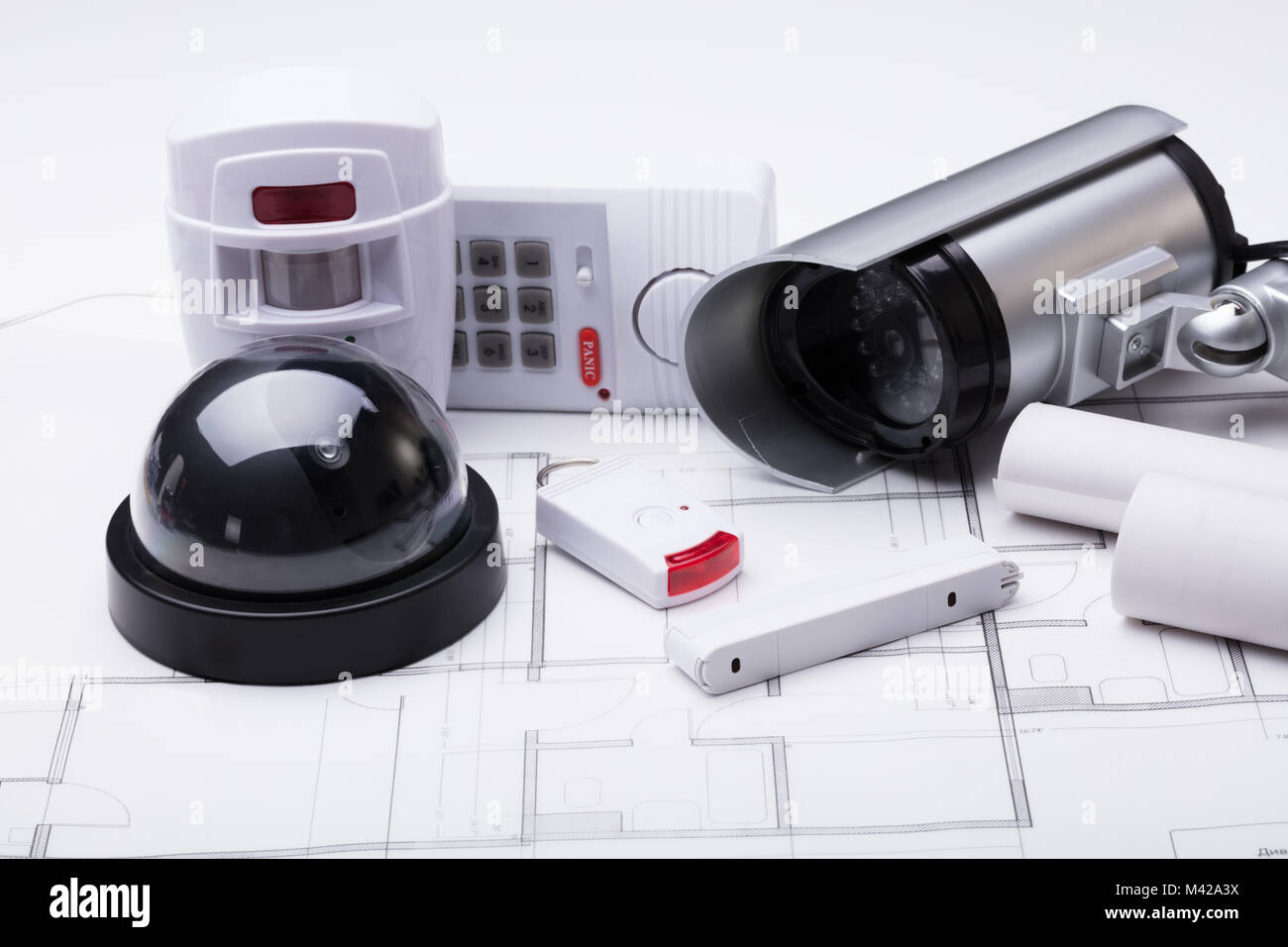 Photo Of Security Equipment On Blueprint In Office Stock Photo - Alamy