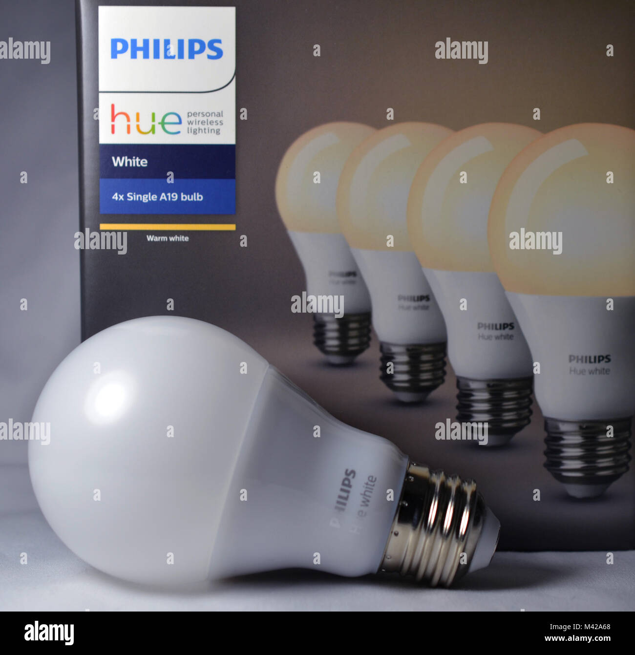 Phillips Hue Light Bulb with package in back Stock Photo - Alamy