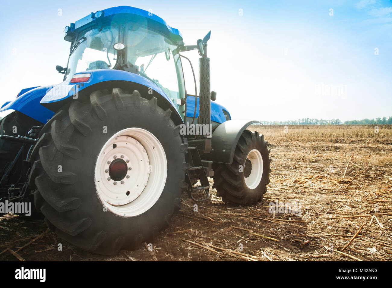 Bright blue tractor hi-res stock photography and images - Alamy