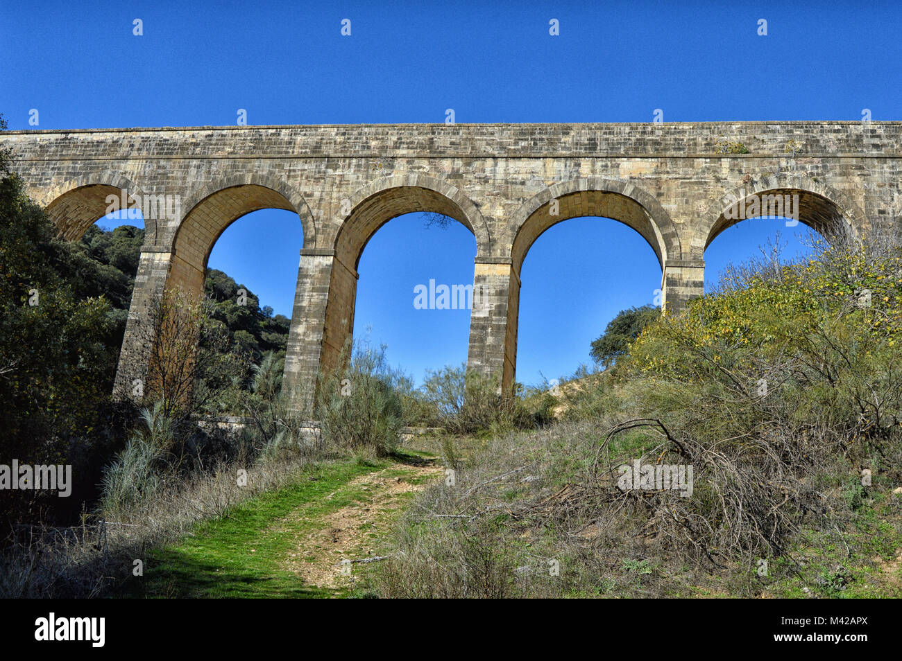 A nineteenth-century stone aqueduct in the countryside in San Agustin ...
