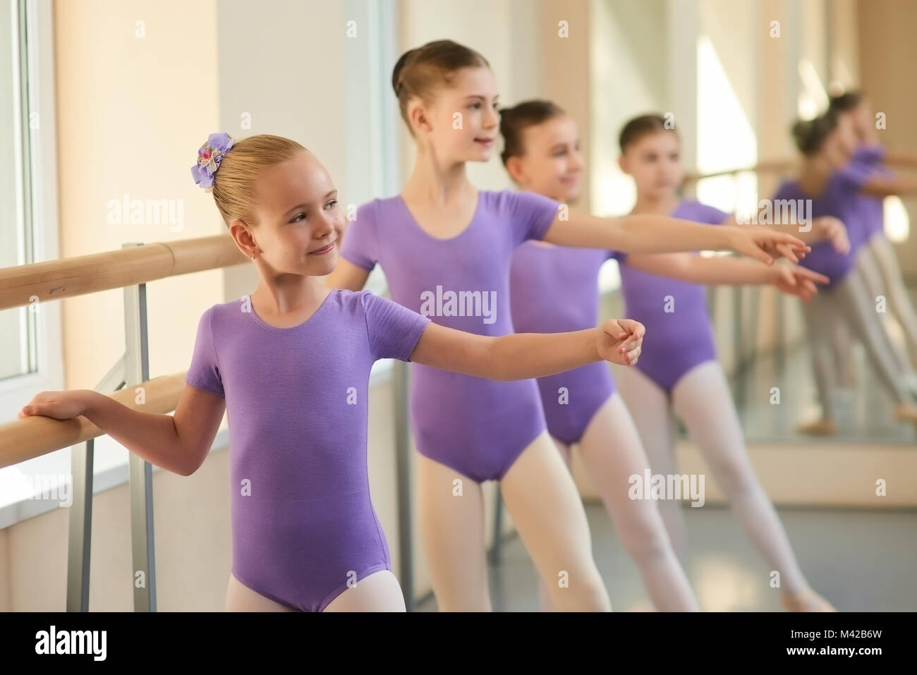Female ballet dancers having rehearsal. Cute little ballerinas ...