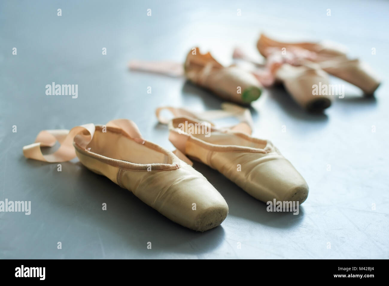 Close up old ballet pointe shoes. Traditional slippers for classical ...