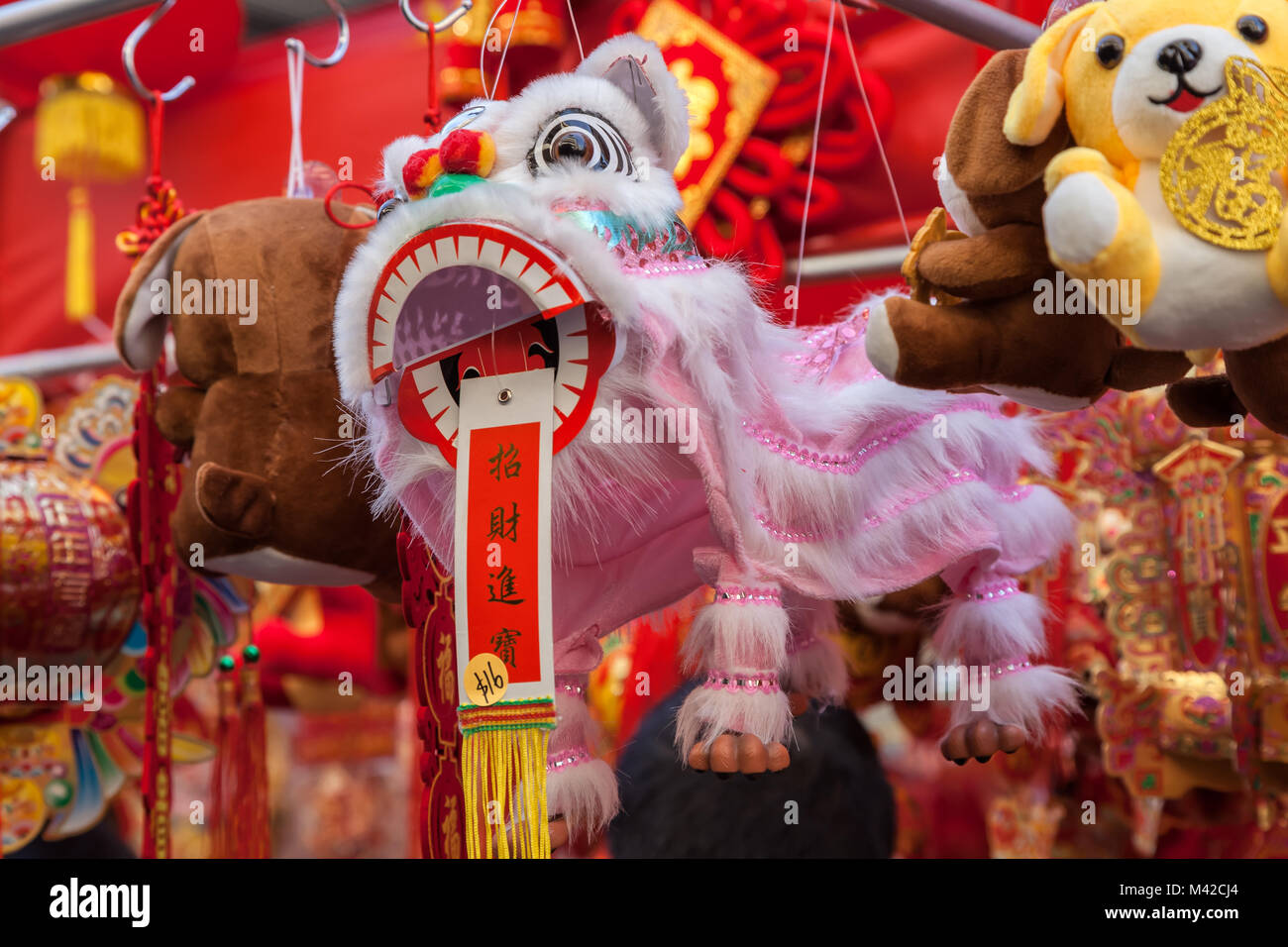 A toy size of the lion dance costume on display for sale in San ...