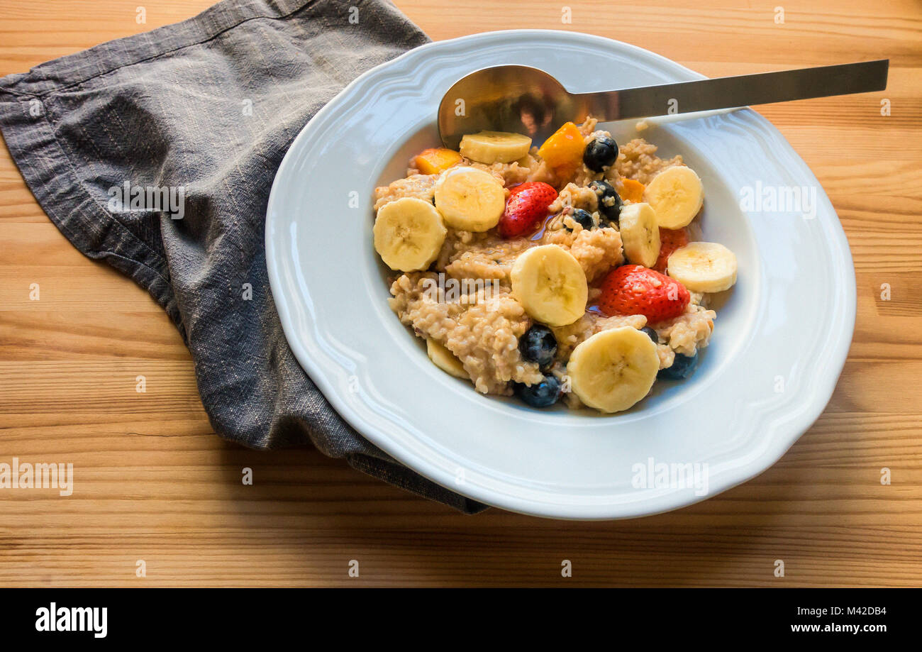 Oatmeal with fruit Stock Photo - Alamy
