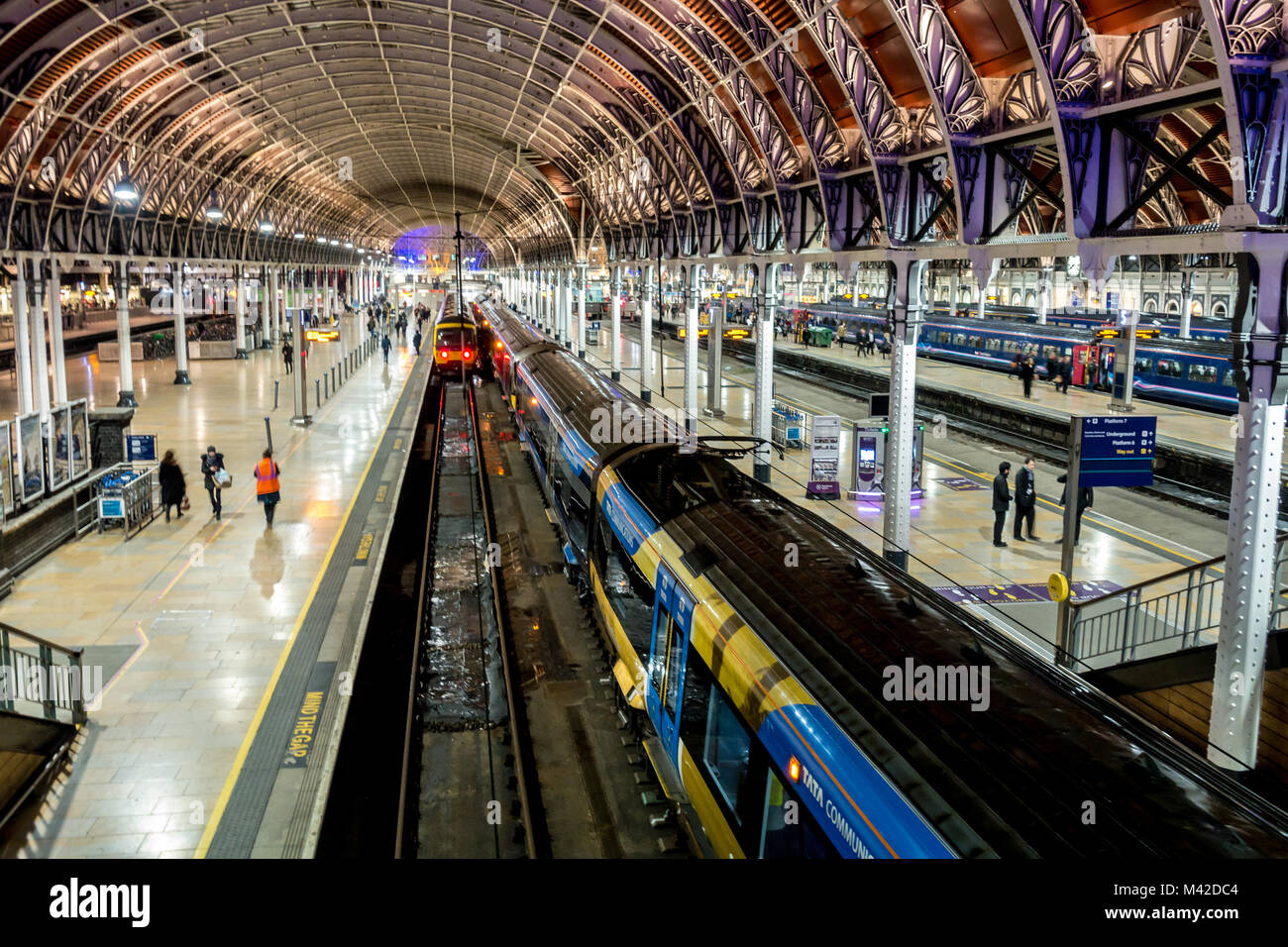 Trains wait at the platform at Paddington Railway Station in London, UK ...