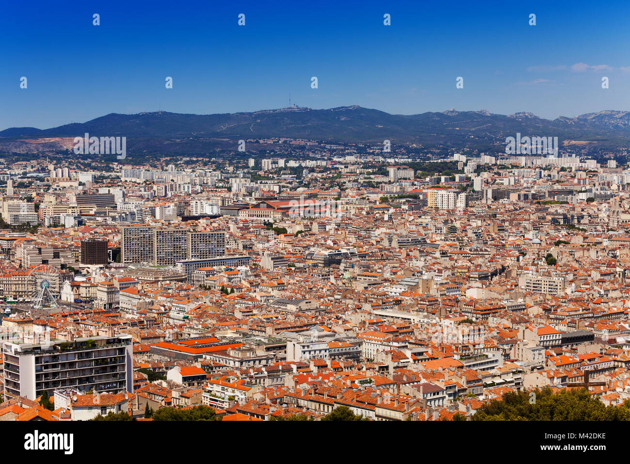 Panoramic view of Marseille with ferris wheel at Vieux-Port, France ...