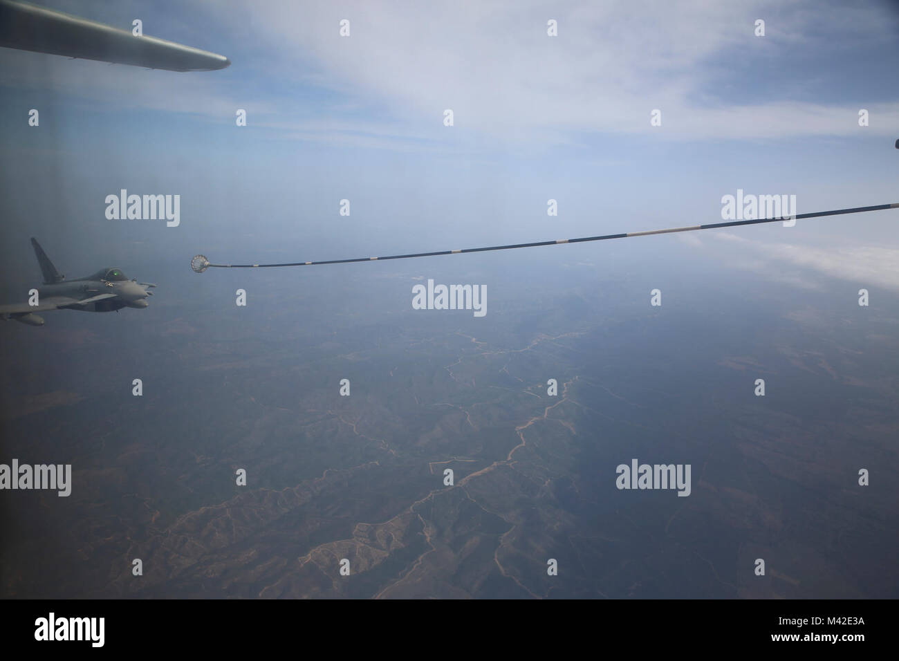A Spanish Air Force Eurofighter Typhoon trails a U.S Marine KC-130J ...