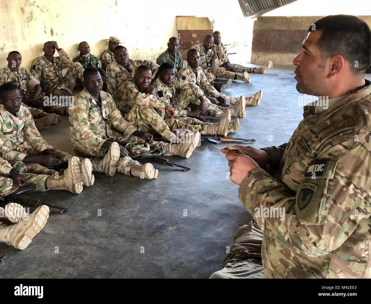 Twelve Soldiers U.S. Army Soldiers share tactics and training with a ...