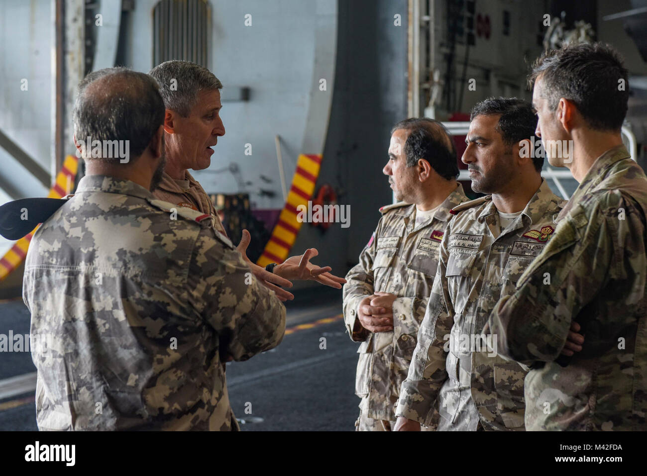 ARABIAN GULF (Feb. 6, 2018) Rear Adm. Steve Koehler, second from left ...