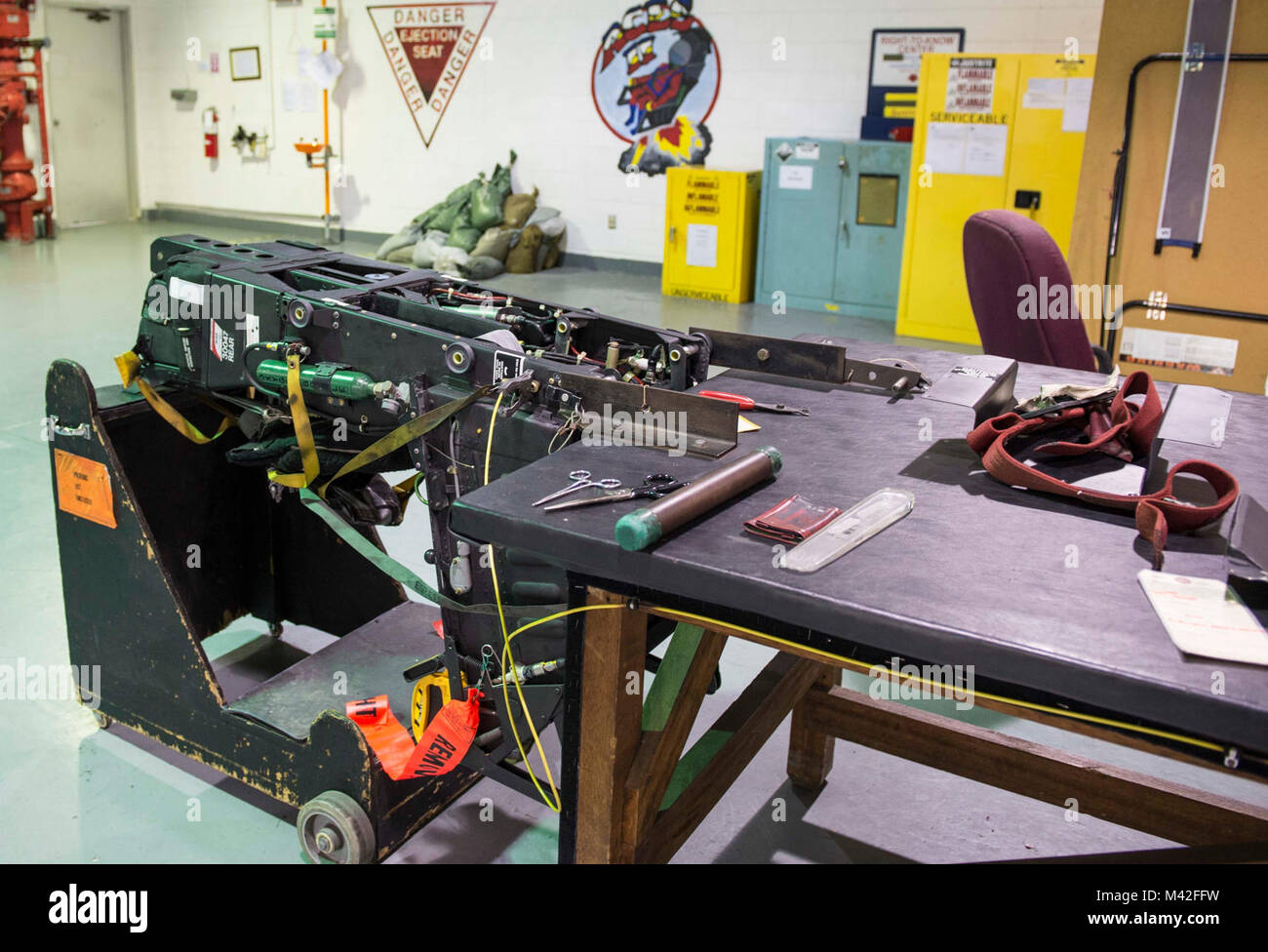 An F-15 Eagle ejection seat sits in the 18th Component Maintenance ...