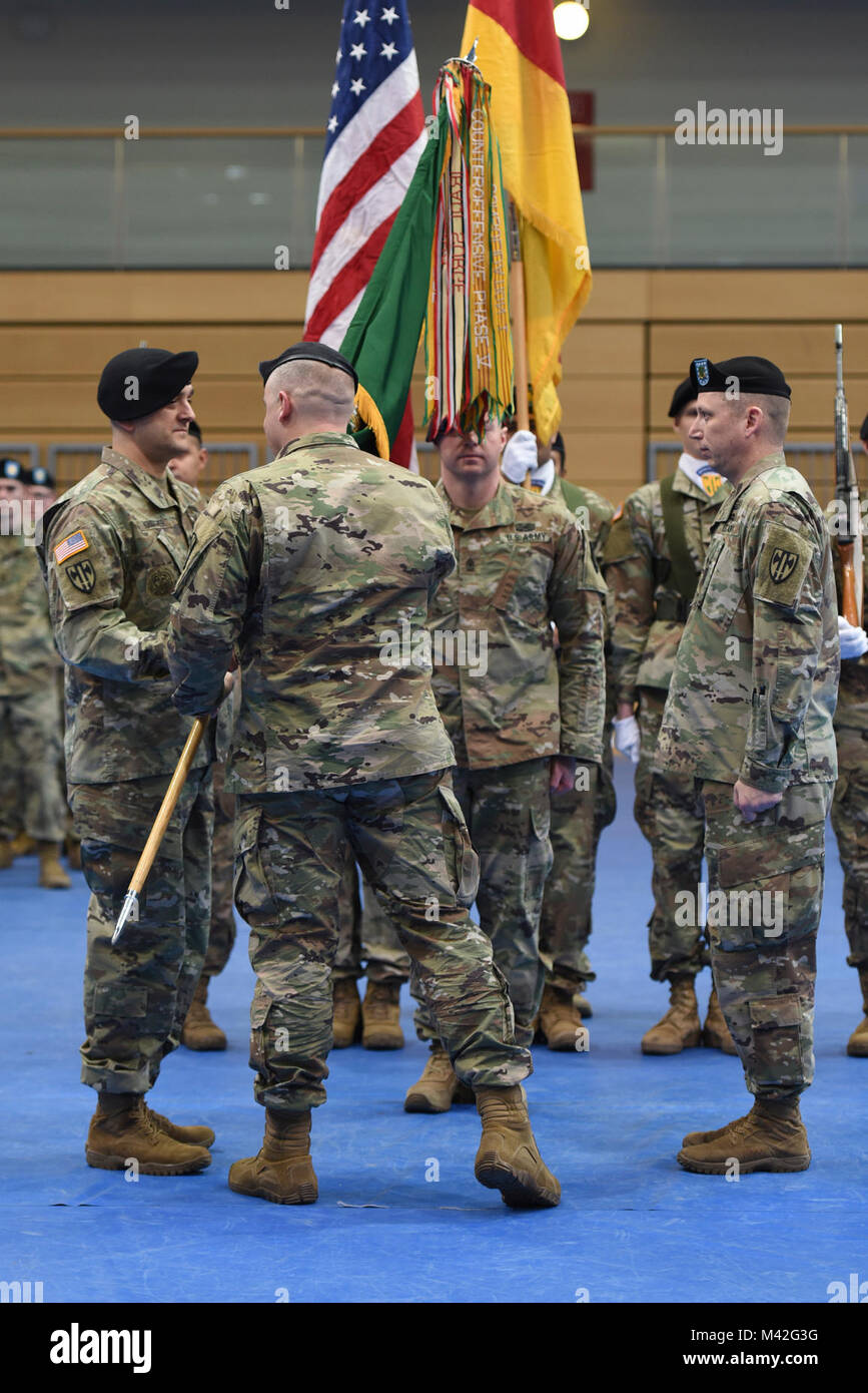 U.S. Army Command Sgt. Maj. Joshua Kreitzer, left, incoming senior ...