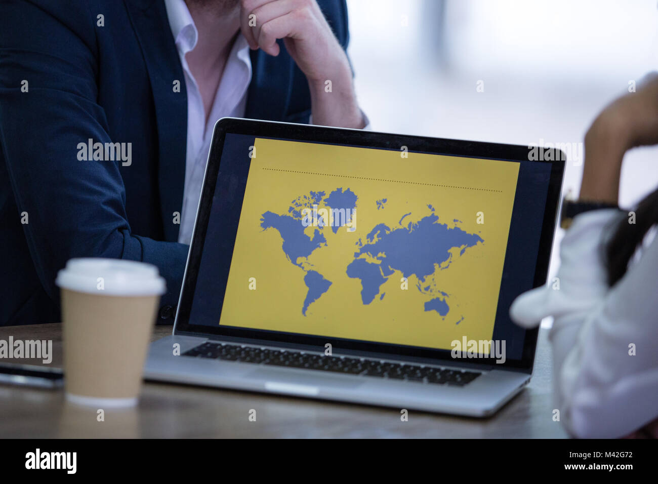Laptop presentation in a meeting Stock Photo - Alamy