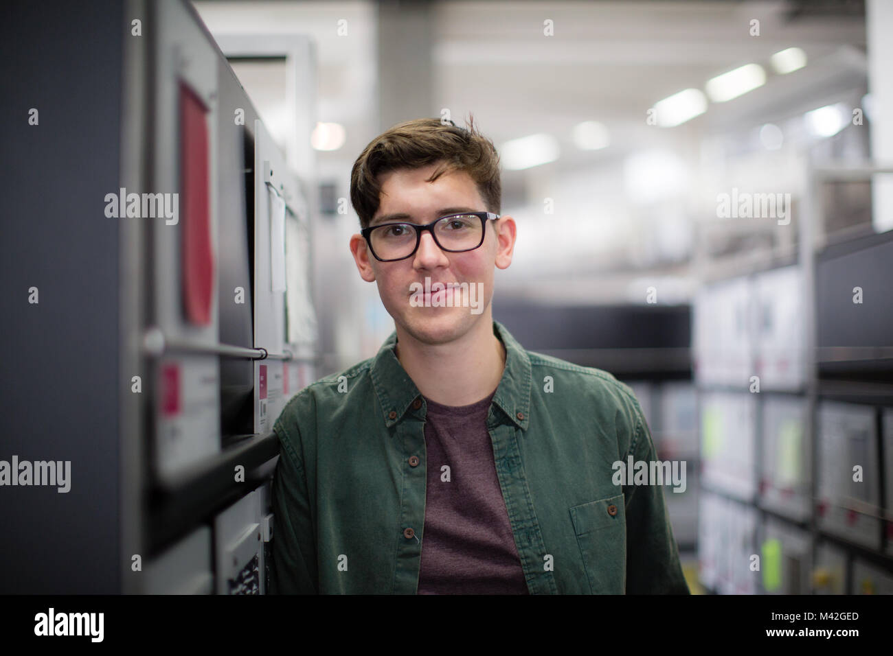Portrait of a student at graduation show Stock Photo - Alamy