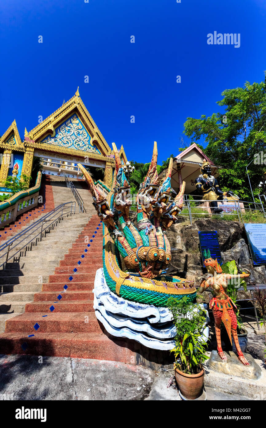 The main stairs leading to Wat Khao Rang temple with boards description ...
