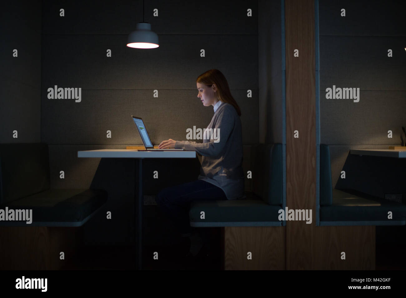Working alone at night hi-res stock photography and images - Alamy